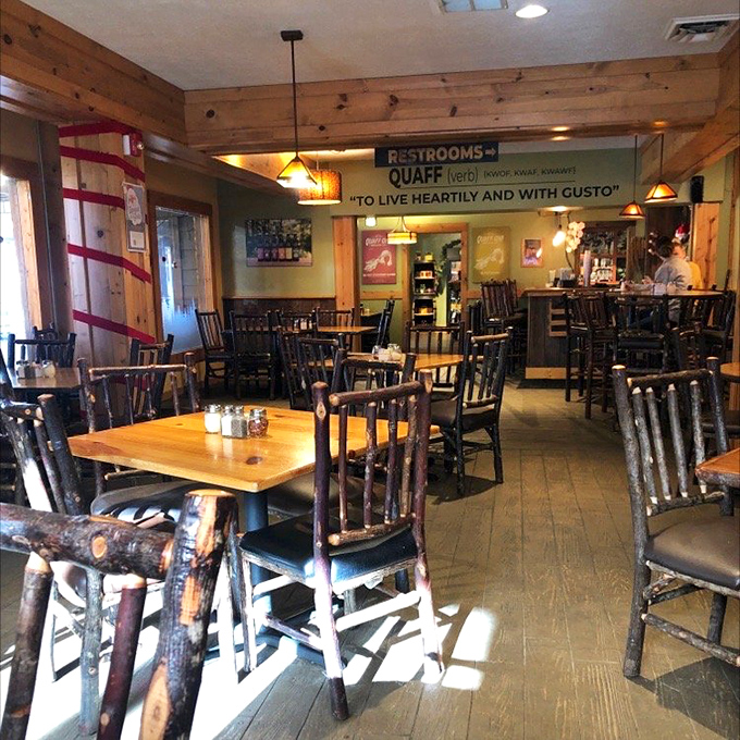 Rustic meets refined in Big Woods' dining room. Those hickory chairs and wooden beams aren't just decoration – they're setting the stage for comfort food elevated.