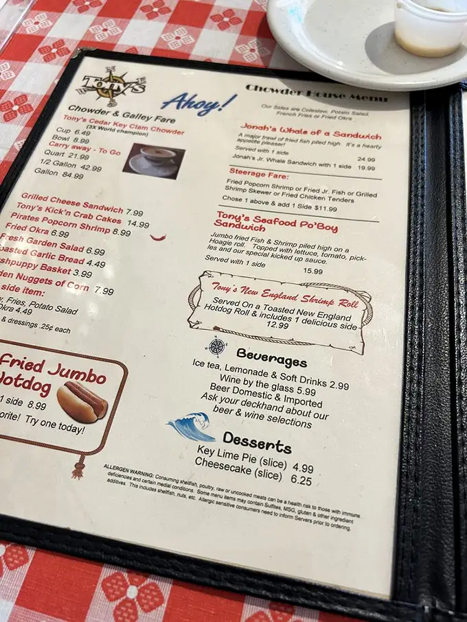 The menu reads like a love letter to seafood enthusiasts. Tony's Cedar Key Clam Chowder proudly wears its "World Champion" crown—and rightfully so.