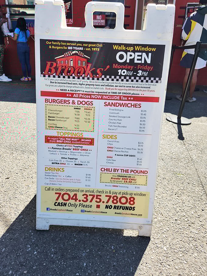 The sign says it all—five decades of family tradition, served "all the way" with that legendary secret chili recipe.