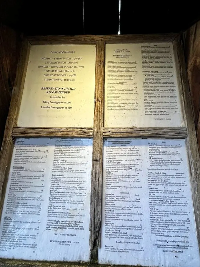 A menu encased in weathered wood frames – like a treasure map where X marks the spot for your next food obsession.