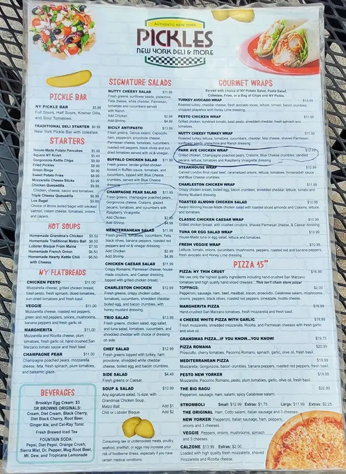 A menu that reads like a love letter to New York deli culture. Each item promises a bite of the Big Apple, from matzo ball soup to mile-high sandwiches.