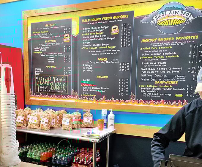 This menu board isn't just listing food options—it's offering life choices. The flame decorations aren't just for show; they're a warning of the flavor explosion to come.