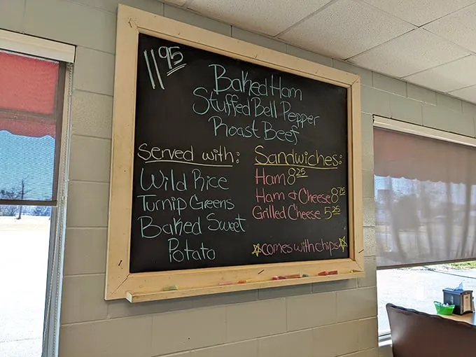 The daily specials board – a handwritten promise of Southern comfort that changes with the seasons but always delivers on flavor.