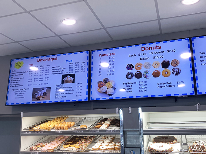 The menu board tells a story of restraint – no fancy flavor combinations named after celebrities, just honest donut craftsmanship at its finest.