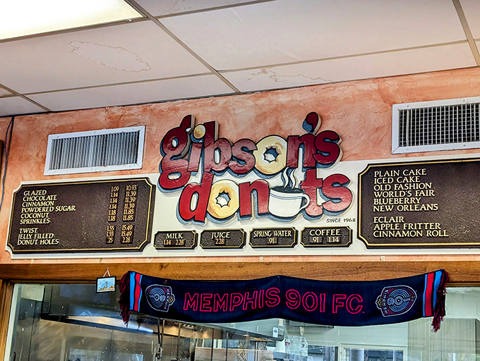 Simple menu boards at Gibson's tell you everything you need to know—no QR codes, no substitutions, just donut perfection that hasn't needed updating in decades.