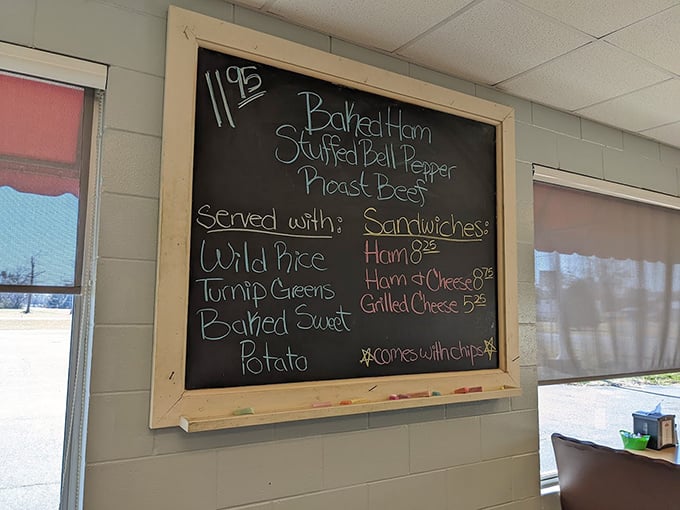 The chalkboard menu at Lea's speaks the universal language of comfort. These aren't just dishes—they're edible hugs from a Southern grandmother.