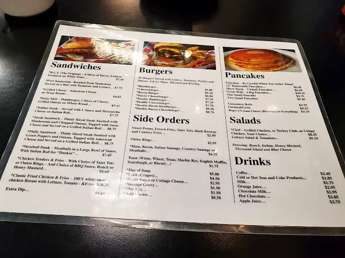 This isn't a menu – it's a roadmap to happiness with no wrong turns, offering comfort classics at prices that won't require a second mortgage.