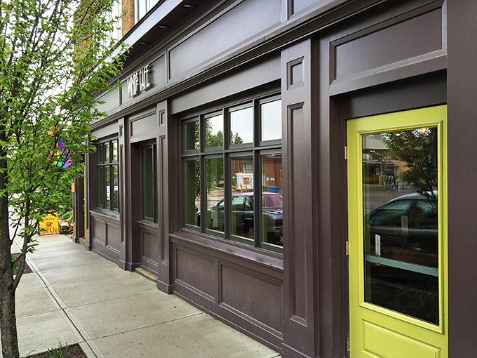 That chartreuse door at The Winds Café isn't just a statement piece—it's a portal to one of Ohio's most surprising culinary adventures.