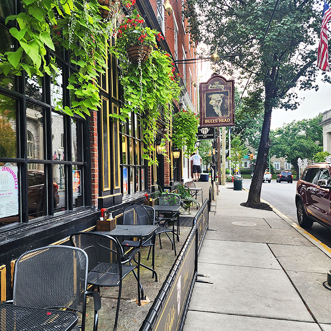 The ivy-covered facade of Bulls Head Public House beckons with promises of authentic English ales and conversation that doesn't require a phone signal.
