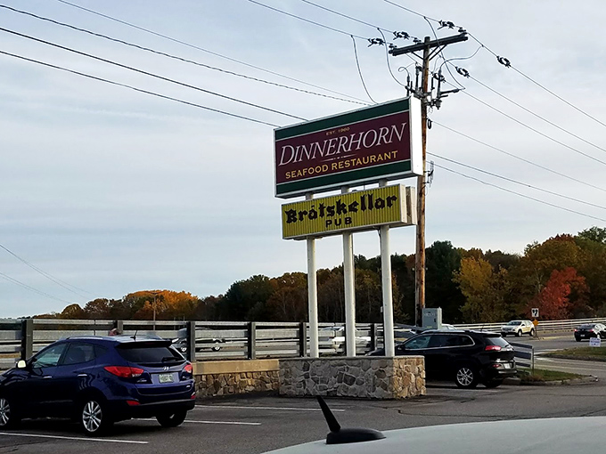 The Bratskellar sign stands like a lighthouse, guiding hungry souls to pizza salvation in Portsmouth's sea of dining options.