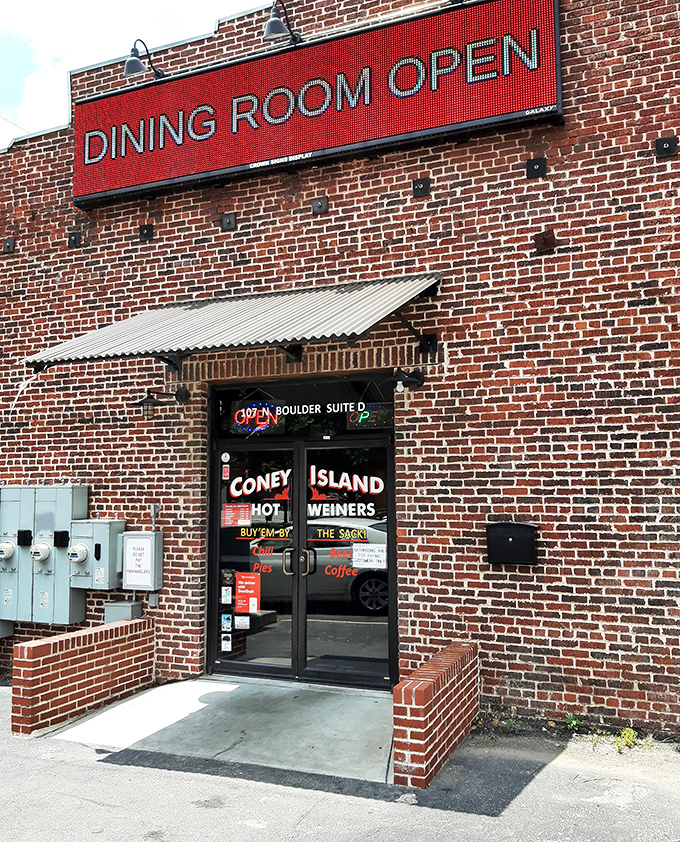 Behind these brick walls and understated entrance lies a hot dog sanctuary where mustard and memories flow in equal measure.