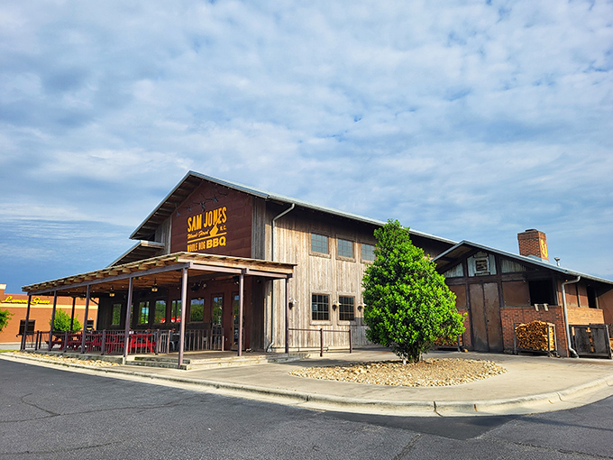 Sam Jones' rustic barn-like structure is basically a cathedral where worshippers gather to praise the gospel of whole hog.