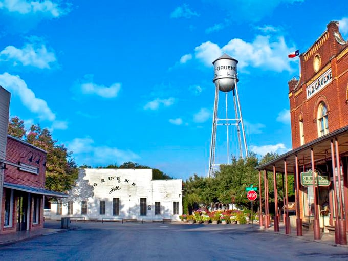Gruene's water tower watches over the town like a faithful sentinel, keeping time while the dance hall swings below.