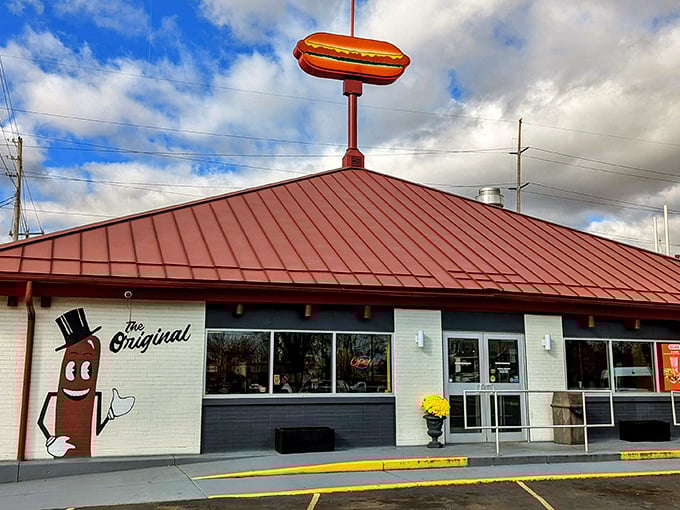 That iconic hot dog sign isn't just advertising – it's a promise of snap, sizzle, and satisfaction that Warren residents treasure.