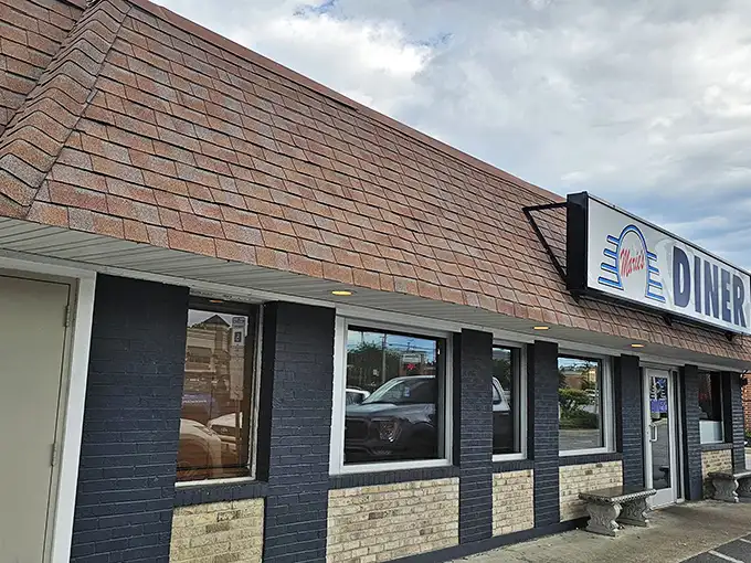 Marie's Diner stands proudly against the suburban landscape – where calories don't count and coffee cups are never empty.
