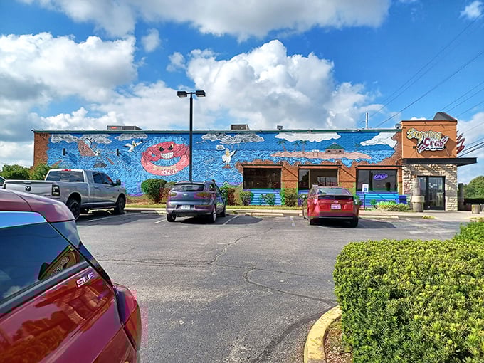 That ocean mural might be the closest thing to a beach view in Lexington. The seafood inside makes the coastal illusion complete.