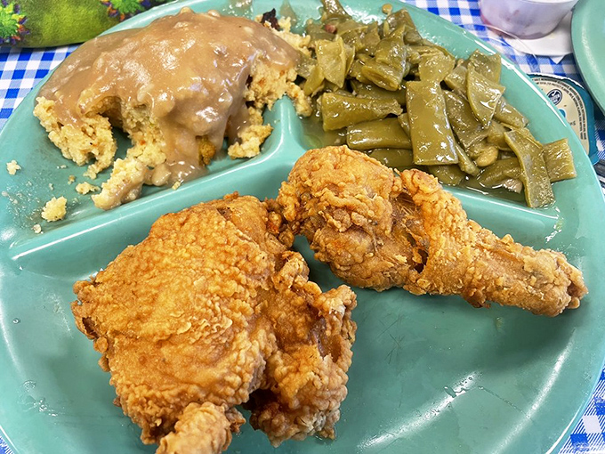 Golden-brown perfection meets fork-tender interior in a fried chicken masterpiece that makes you question all other chicken you've ever eaten.