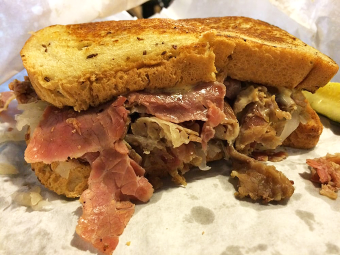 A perfectly executed sandwich masterpiece, where each ingredient knows its role. That pickle on the side isn't just garnish—it's essential punctuation.