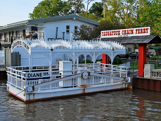 All aboard the Diane! Saugatuck's hand-cranked chain ferry isn't just transportation—it's a floating time machine operating since 1838 that still delights passengers today.