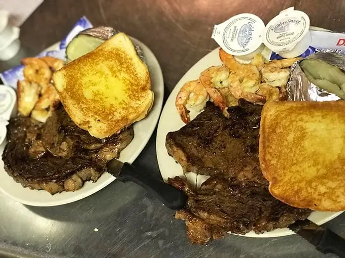 This 12-ounce ribeye isn't just dinner—it's a religious experience with a side of Texas toast and pickles.