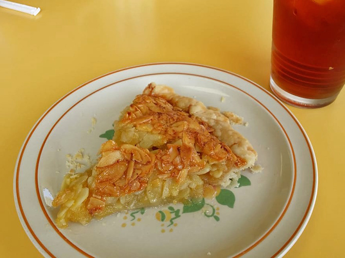 Golden, flaky crust giving way to creamy filling—this slice doesn't just satisfy hunger, it creates memories.