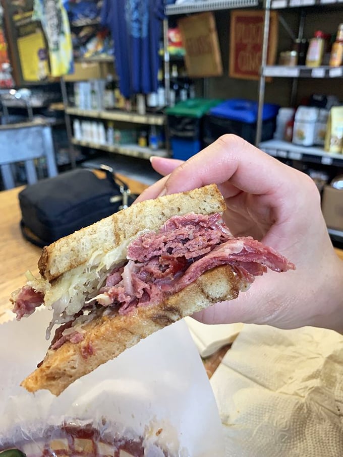 Behold the architectural marvel that is Stein's Reuben—where corned beef, sauerkraut, and Swiss cheese achieve a harmony that symphony orchestras envy.