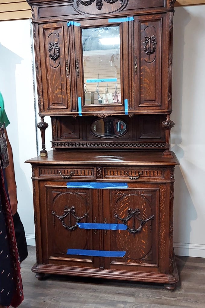 This ornate antique cabinet isn't just furniture—it's a time machine with drawers, telling stories of dinner parties and family gatherings from another era.