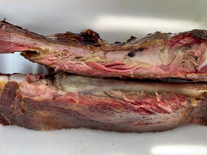 These ribs aren't just falling off the bone—they're practically jumping into your mouth. The perfect pink smoke ring is the BBQ equivalent of a Michelin star.
