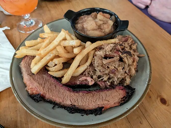 Brisket with that coveted pink smoke ring paired with pulled pork that practically begs to be photographed before it's devoured.