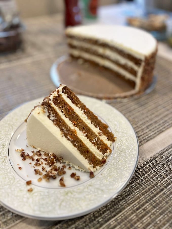 Layer upon magnificent layer, this carrot cake doesn't just satisfy a sweet tooth—it creates a religious experience. The cream cheese frosting alone deserves its own ZIP code.