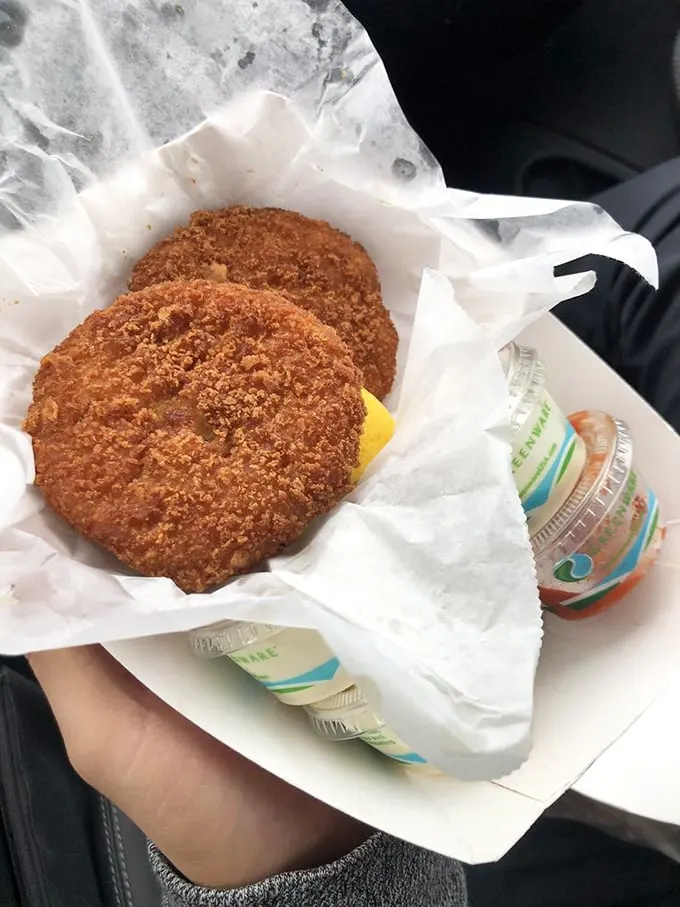 Golden-brown treasures from the deep. These crab cakes aren't just food—they're edible souvenirs from Neptune's kingdom, crispy outside and sweet within.
