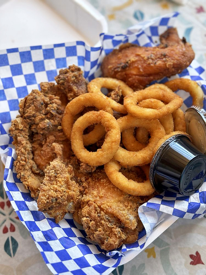 Crispy chicken and golden onion rings: proof that sometimes the simplest pleasures are worth crossing state lines for.