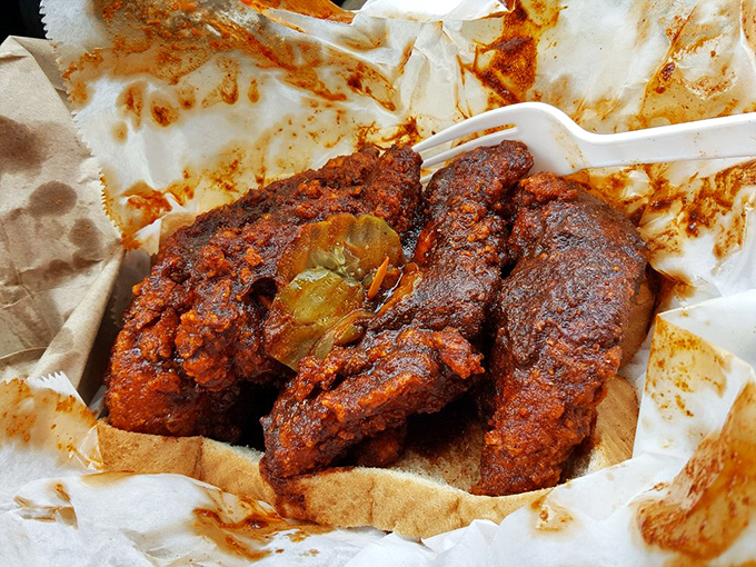 This isn't just chicken; it's Nashville history on a plate. That deep russet color isn't for show—it's a promise of the flavor explosion to come.