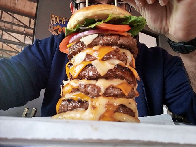 Not so much a burger as a skyscraper of beef and cheese requiring architectural engineering skills to consume. Your jaw will need to stretch like a python.
