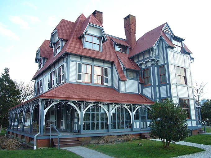 This blue Victorian masterpiece looks like it's auditioning for a Wes Anderson film – complete with wraparound porch perfect for rocking chair philosophers.