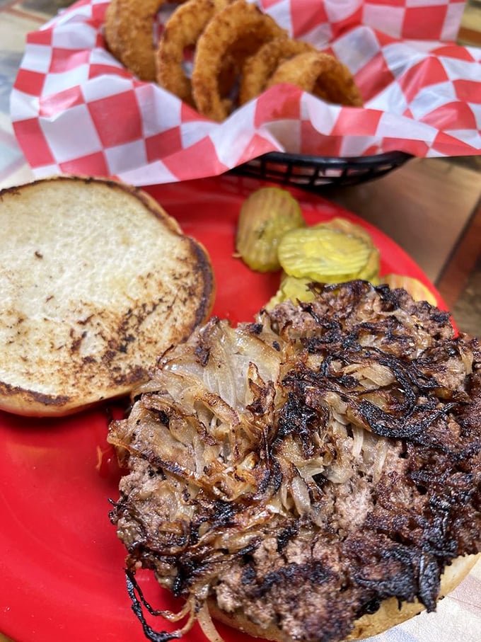 Behold the star of the show! Caramelized onions melted into beef create a flavor symphony that makes you wonder why all burgers aren't made this way.