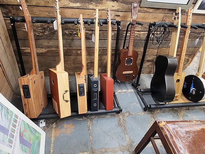 From cigar box guitars to classic acoustics, this musical corner might just convince you that your living room needs a vintage instrument wall too.