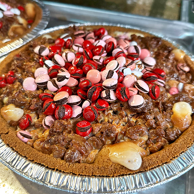 This isn't just pecan pie – it's a masterclass in textural contrast with those candy pieces playing backup to the star performer.