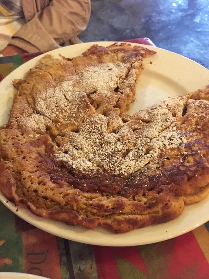 That pumpkin pancake isn't just breakfast, it's autumn on a plate – a golden-brown masterpiece that makes you want to high-five the chef.