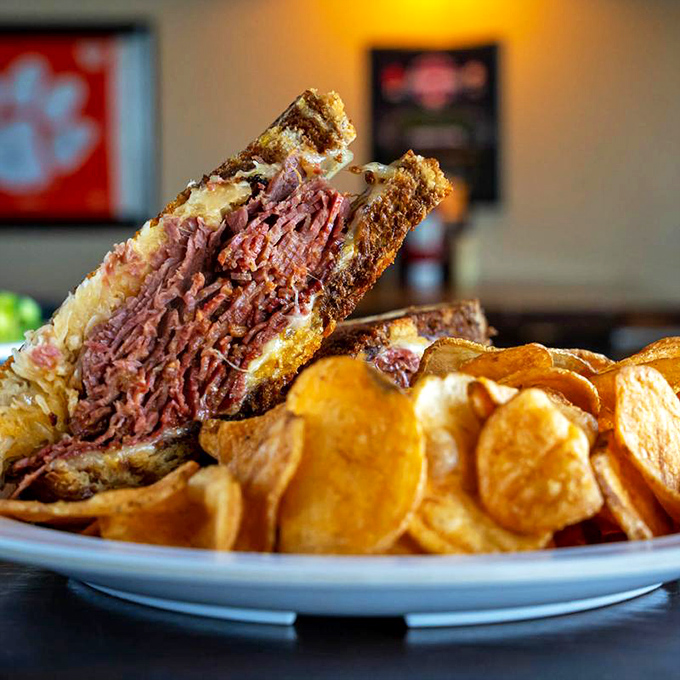 This isn't just a sandwich—it's corned beef architecture, a masterclass in layering that would make Frank Lloyd Wright applaud between bites.