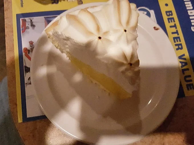 The lemon meringue pie doesn't just have height—it has ambition! Those perfectly toasted peaks are what dessert dreams are made of.