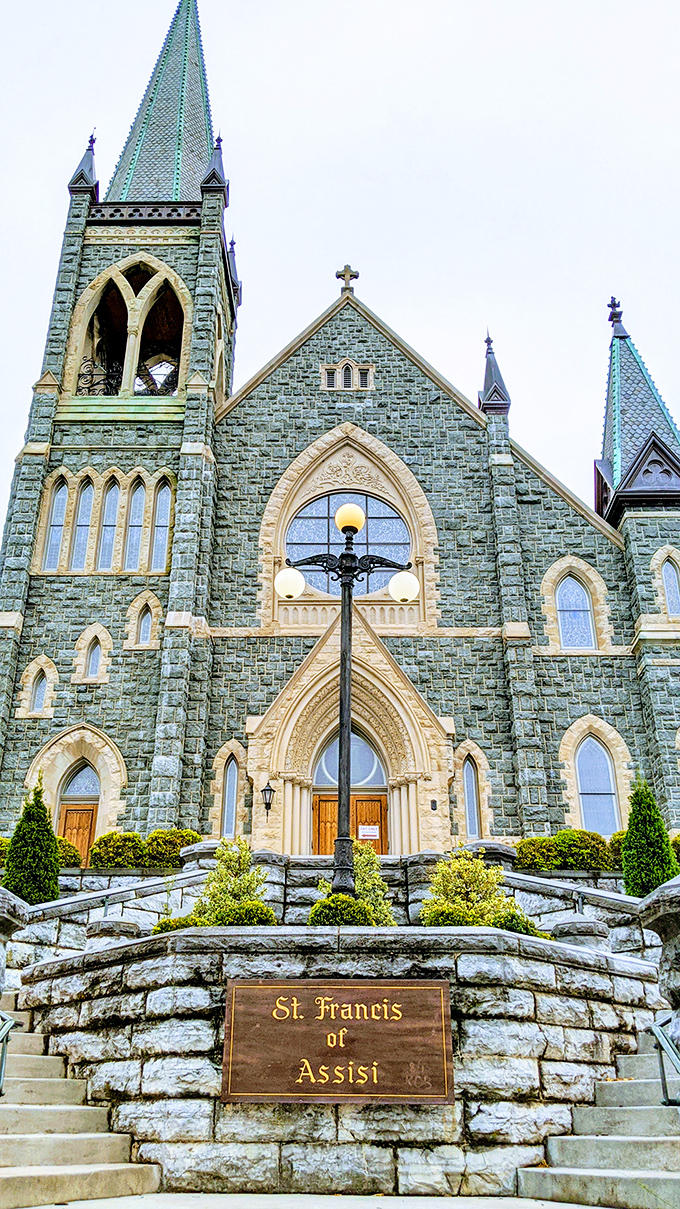 St. Francis of Assisi Church stands as a Gothic masterpiece in stone, its verdant copper spires reaching skyward as if saying, "Yes, we do drama well here."