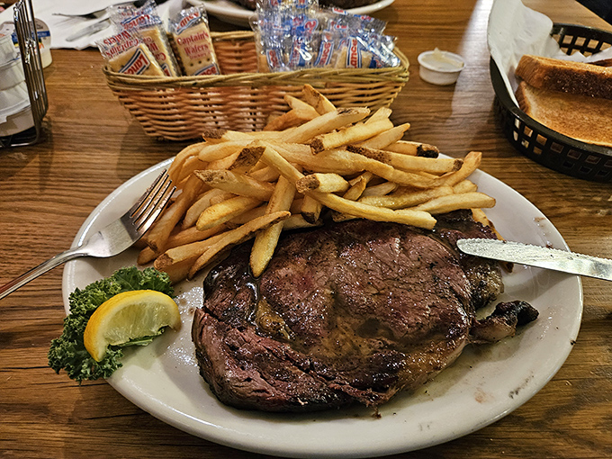 This isn't just a menu—it's a declaration of carnivorous intent. When they boldly proclaim "COOKED OVER OUR OPEN HICKORY PIT," they're not just describing a method; they're making a promise.