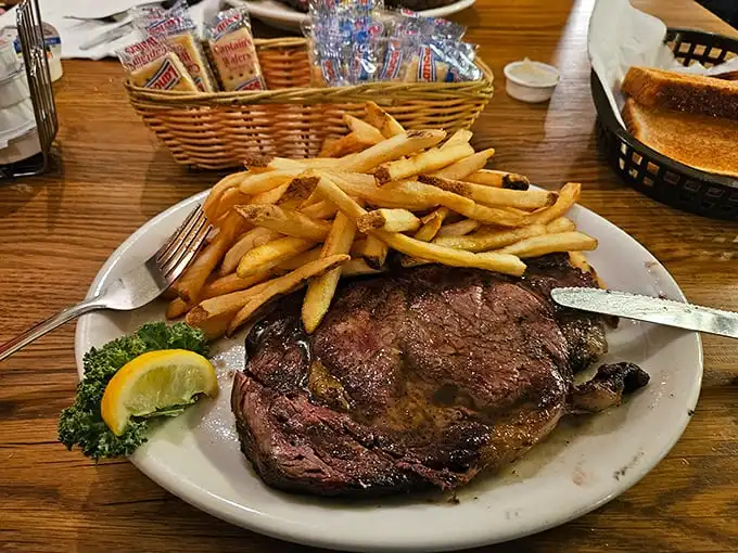 This isn't just a menu—it's a declaration of carnivorous intent. When they boldly proclaim "COOKED OVER OUR OPEN HICKORY PIT," they're not just describing a method; they're making a promise.