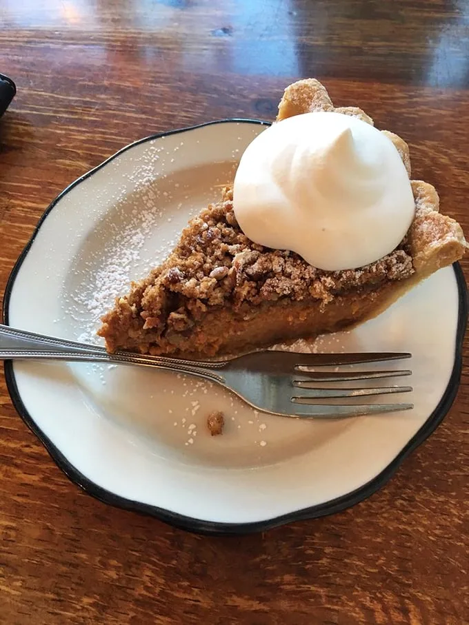 Sweet potato meets pecan in a dessert marriage made in Virginia heaven. That dollop of whipped cream isn't just garnish—it's the perfect dance partner.