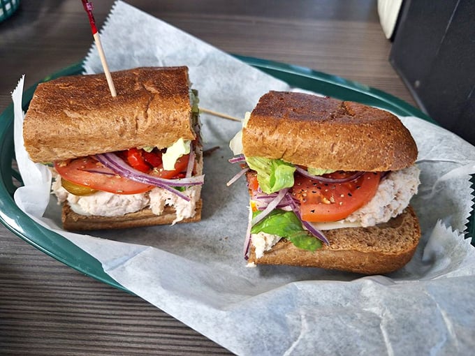 Tuna sandwich architecture at its finest. Notice how the perfectly toasted bread provides structural integrity while vibrant veggies add both color and crunch.
