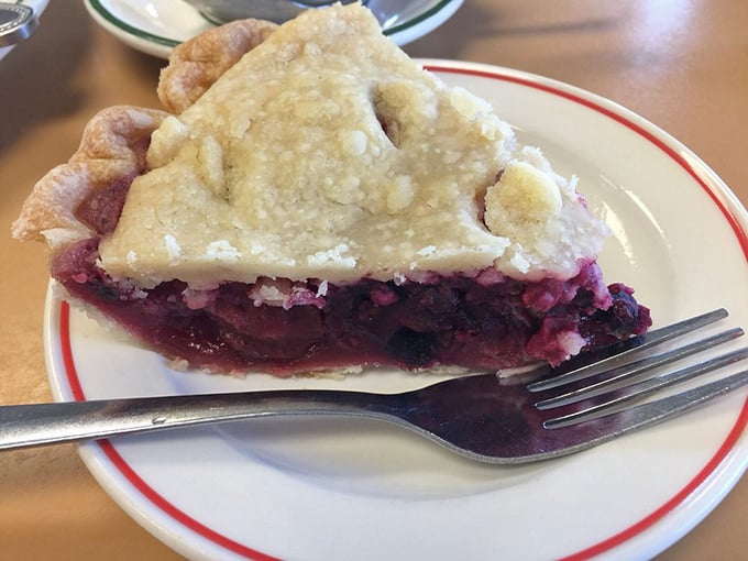 This isn't just berry pie—it's a purple-hued masterpiece of sweet-tart perfection that makes you wonder why you ever bothered with birthday cake.