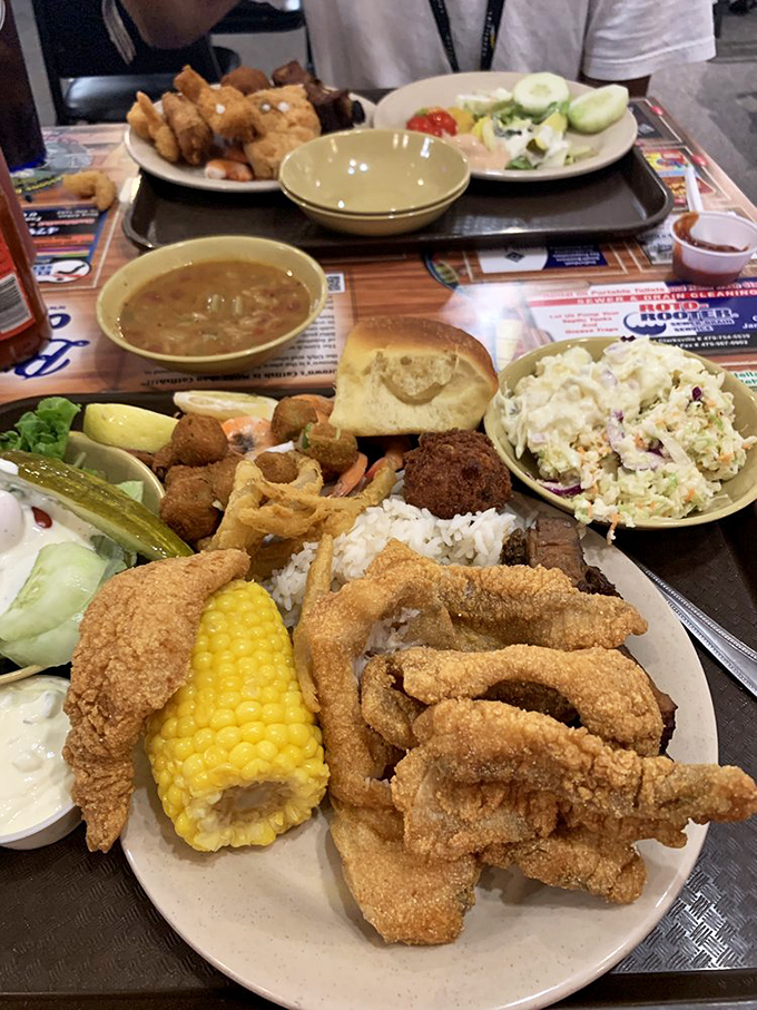 A plate so loaded with golden-fried treasures, corn on the cob, and fixings that it makes you wonder if you should've worn your "eating pants."