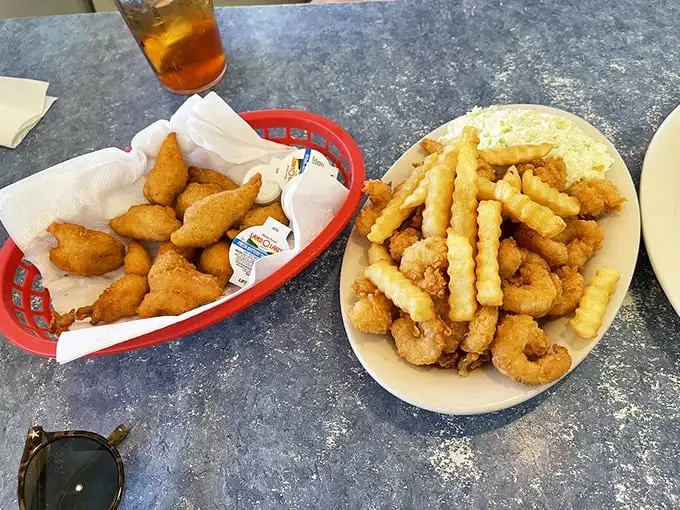 Golden-brown perfection that snaps with each bite—these aren't just fried shrimp, they're little crescents of coastal happiness.