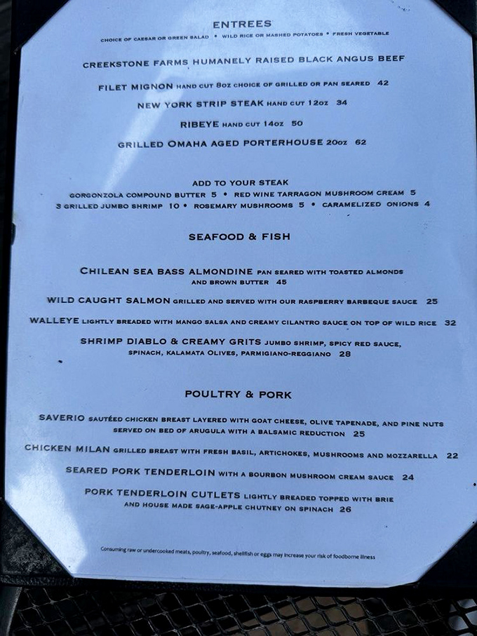 The menu reads like a love letter to fine dining – from humanely raised Black Angus beef to Chilean sea bass almondine, each option more tempting than the last.